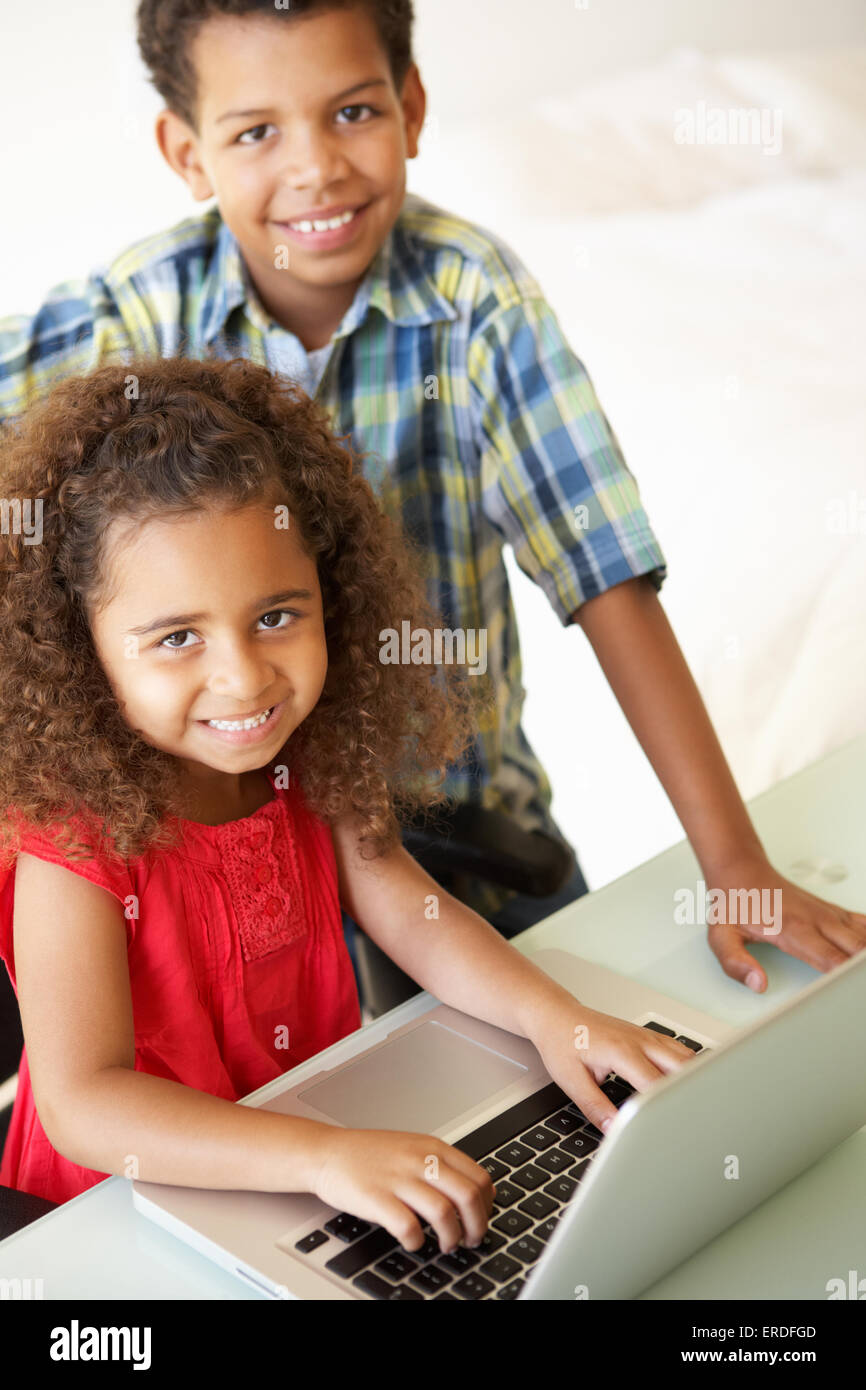 Children Using Laptop At Home Stock Photo - Alamy
