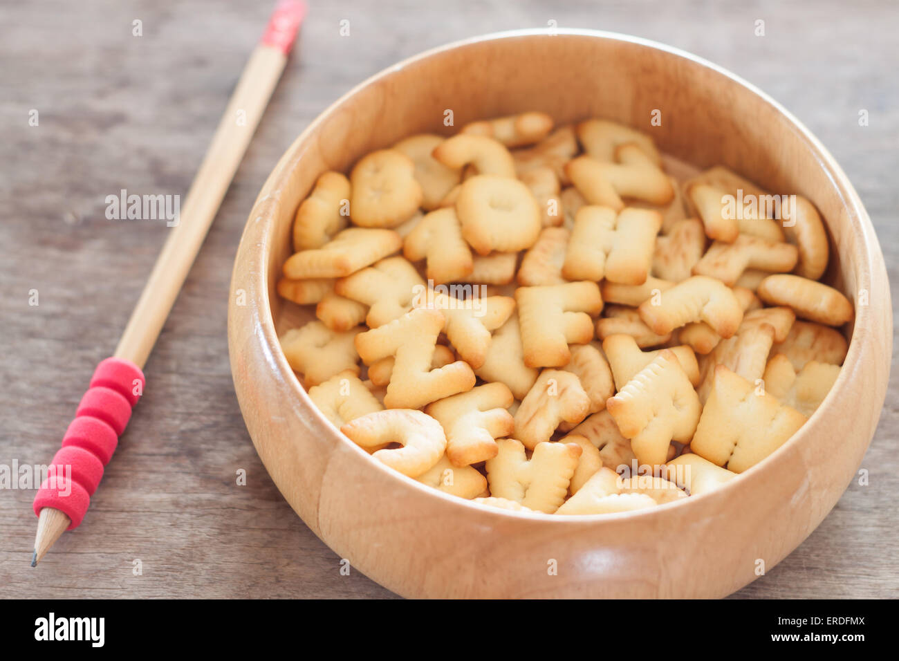 Alphabet biscuit in wooden tray, stock photo Stock Photo - Alamy