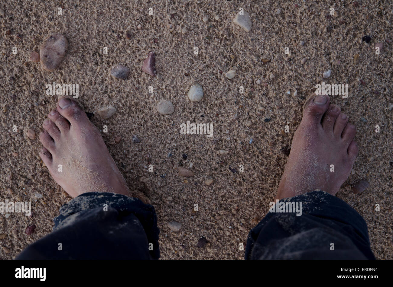 Close-up of feet in the sand Stock Photo - Alamy