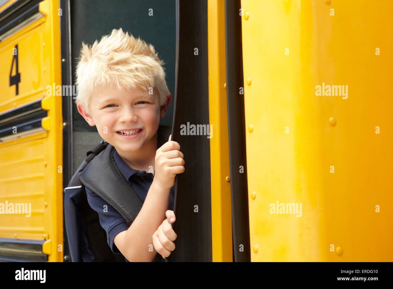 Children getting on school bus hi-res stock photography and images - Alamy