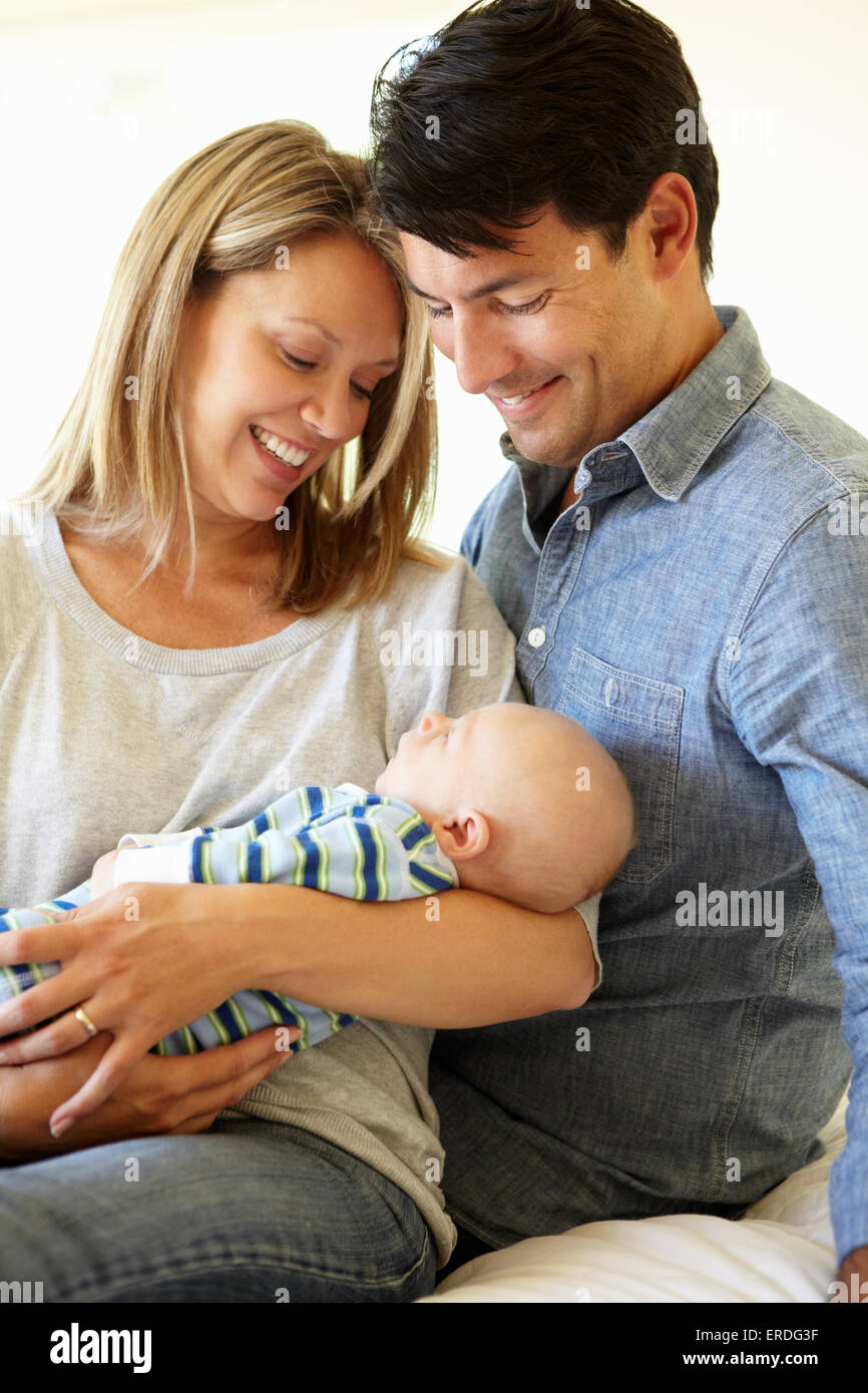 Couple with young baby Stock Photo - Alamy