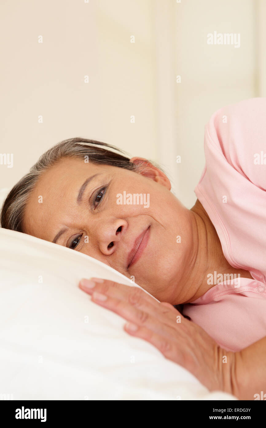 Senior Taiwanese woman resting Stock Photo - Alamy