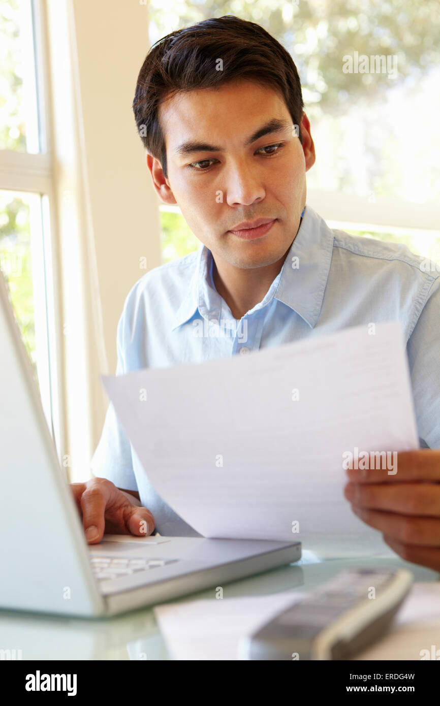 Filipino man working at home Stock Photo - Alamy