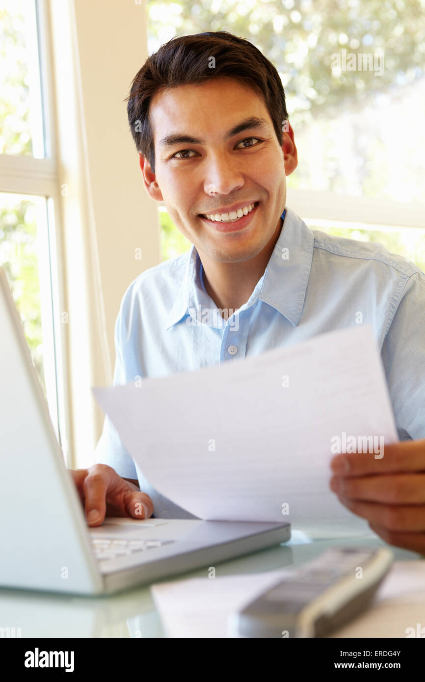 Filipino man working at home Stock Photo - Alamy