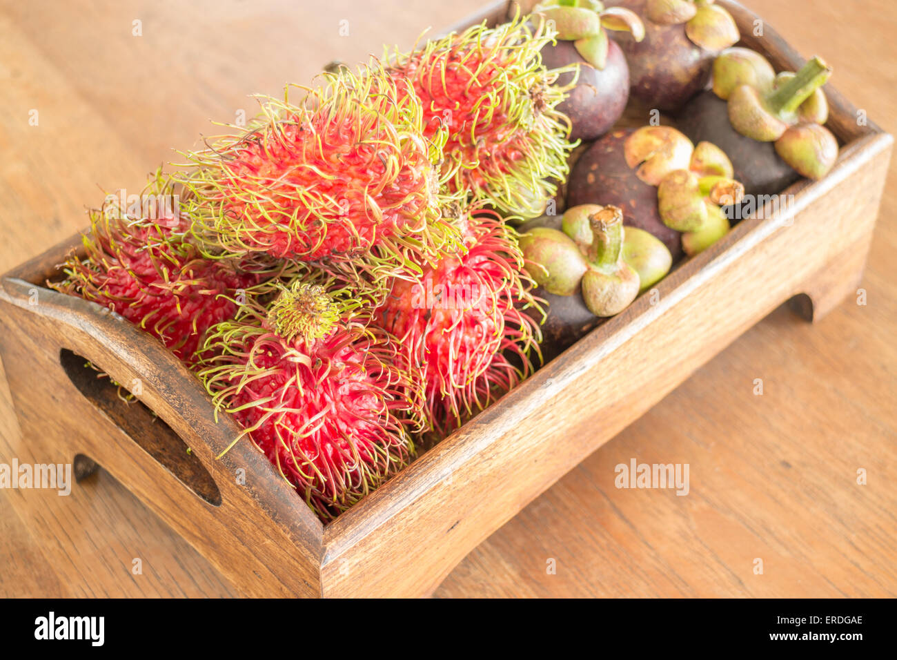 Fresh rambutan and mangosteen on wooden tray, stock photo Stock Photo ...