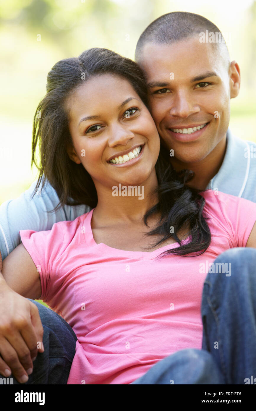 Portrait Of Romantic Young African American Couple In Park Stock Photo ...