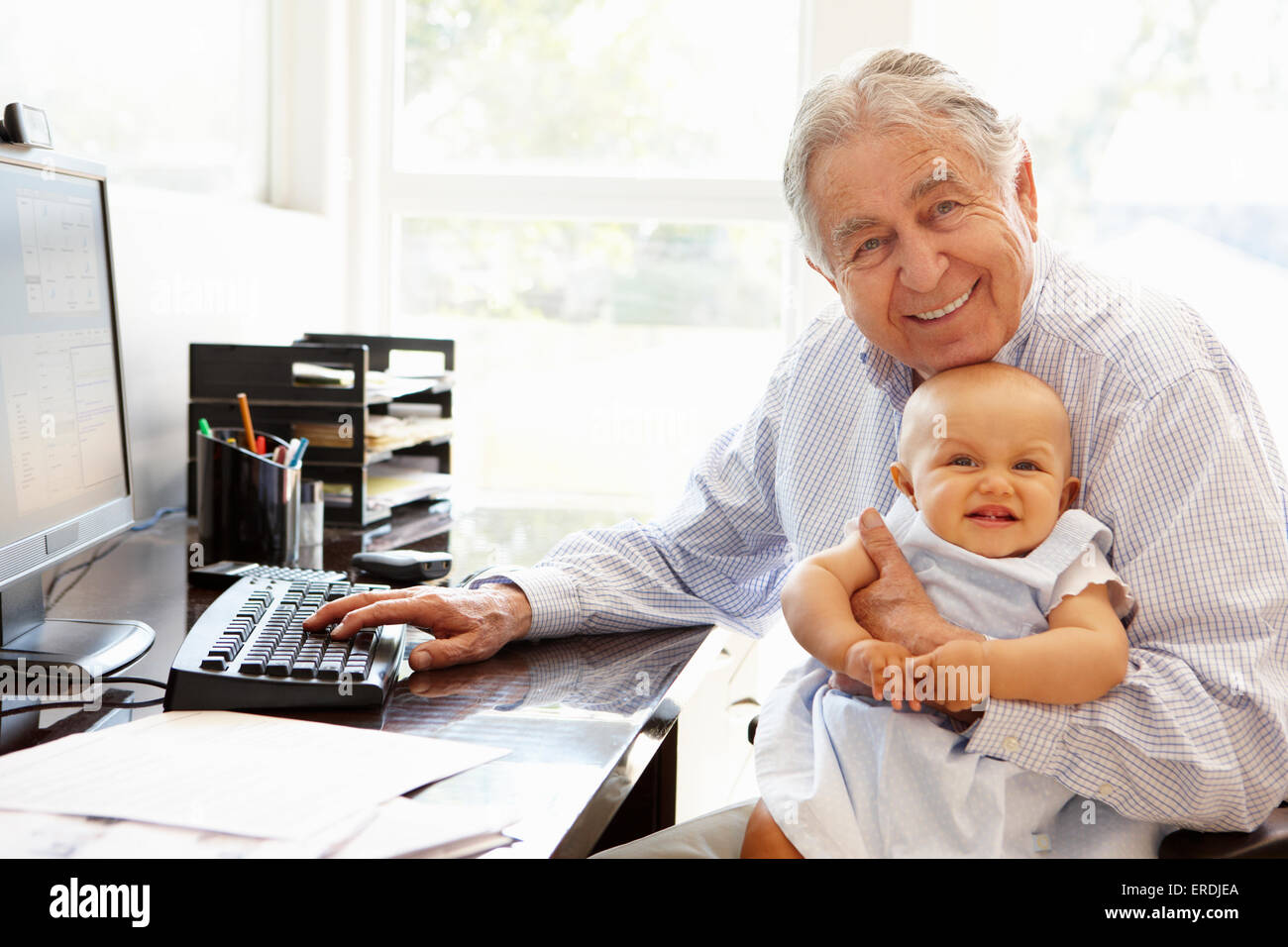 Grandfather baby computer hi-res stock photography and images - Alamy