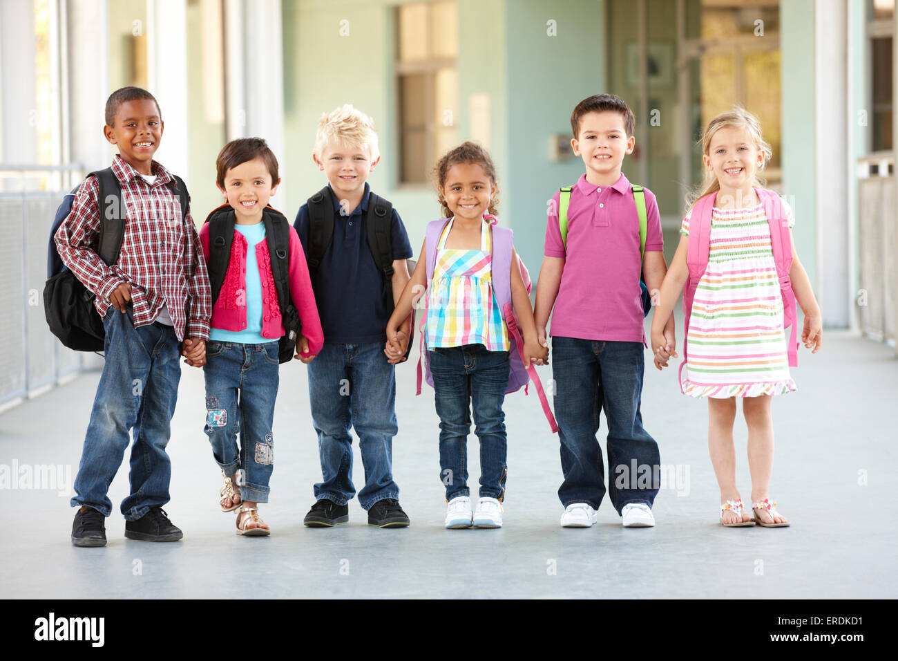Group Of Elementary Age Schoolchildren Standing Outside Stock Photo - Alamy