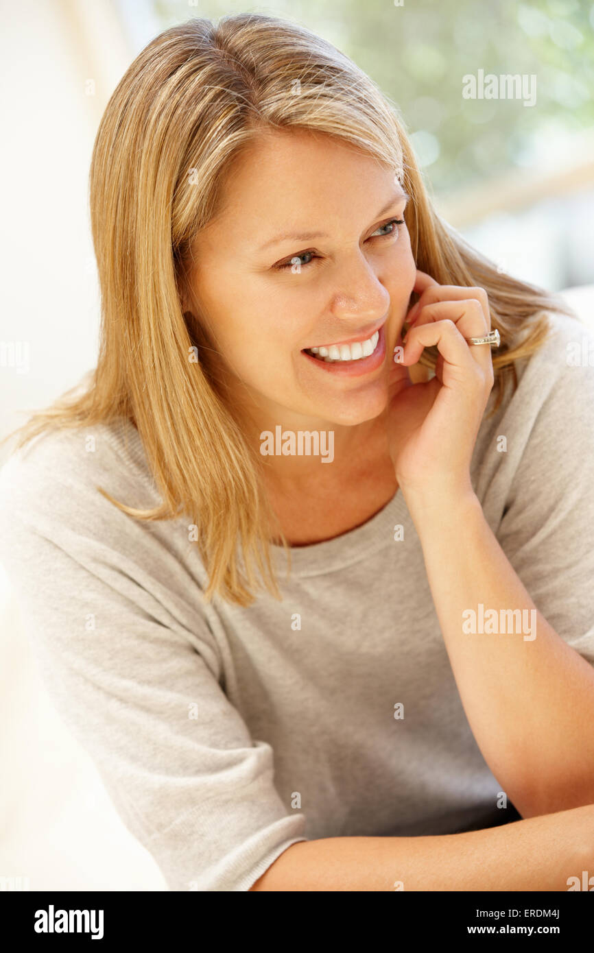 Woman at home portrait Stock Photo - Alamy