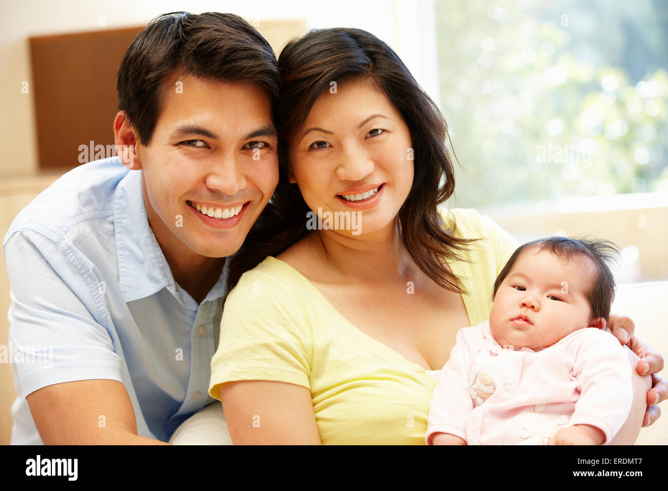 Asian couple and baby Stock Photo - Alamy