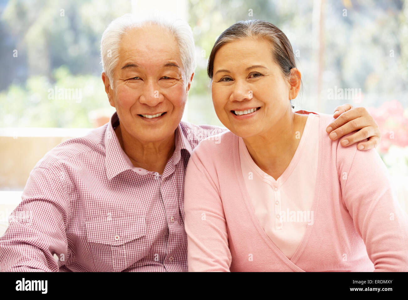 Senior asian couple at home Stock Photo - Alamy