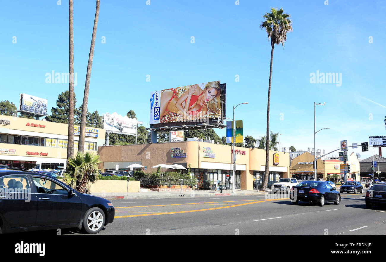 Elena Belle is shown as the new face of 138 Water on a billboard ...