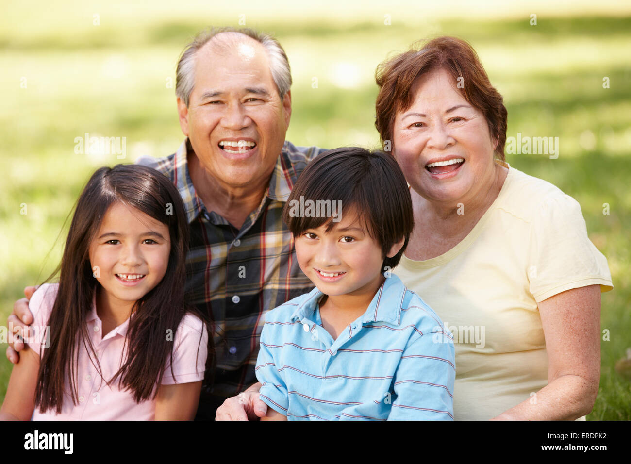 Portrait Asian grandparents and grandchildren in park Stock Photo - Alamy