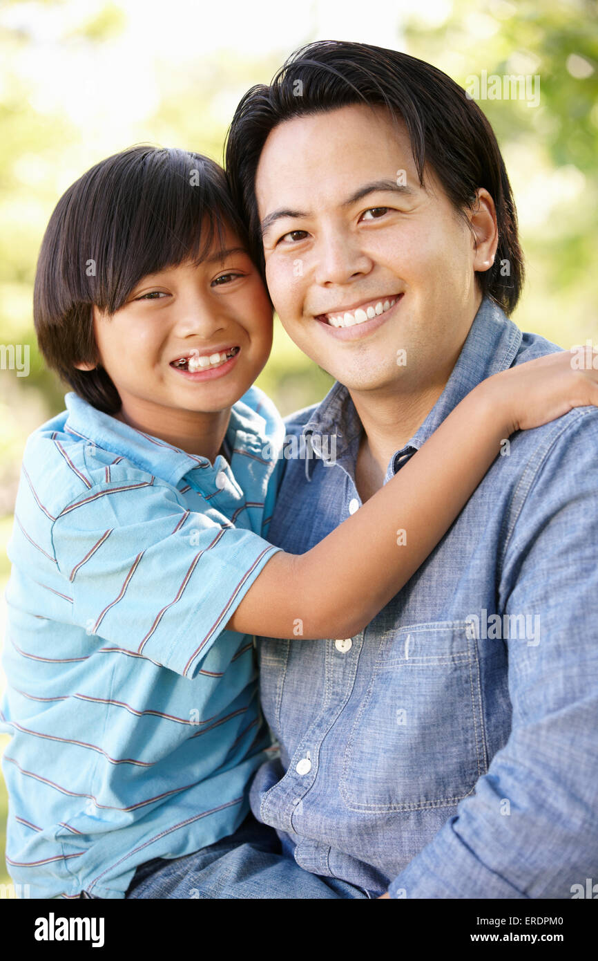 Portrait Asian father and son outdoors Stock Photo - Alamy