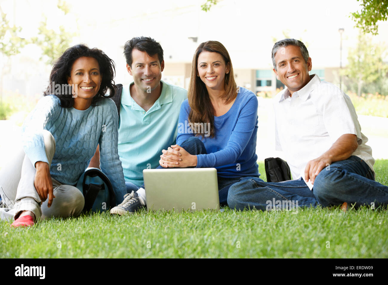 People using laptop outdoors Stock Photo - Alamy