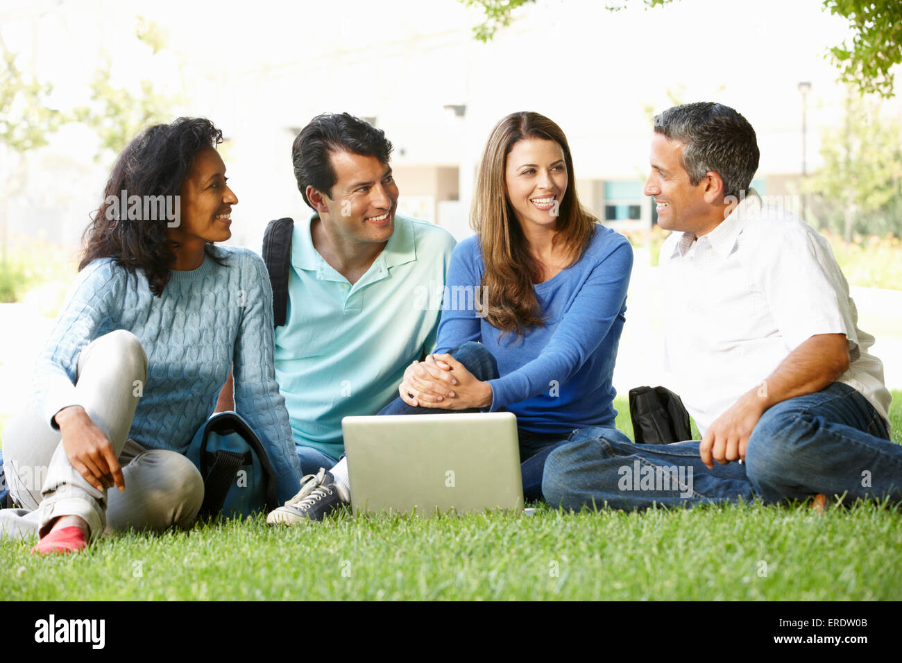 People using laptop outdoors Stock Photo - Alamy