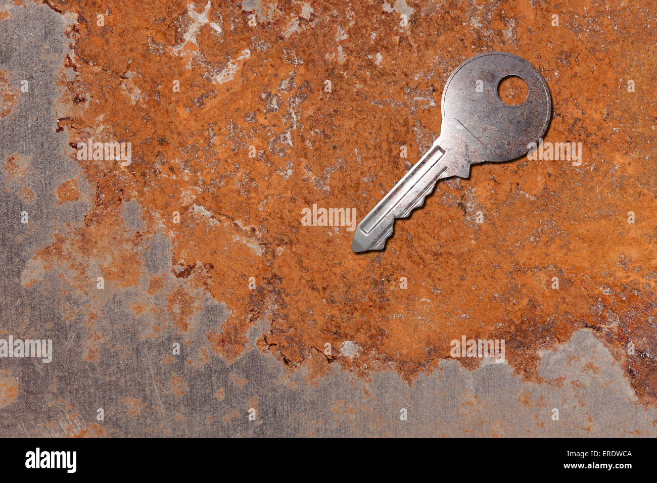 3d rendering of a key on a rusty surface Stock Photo - Alamy
