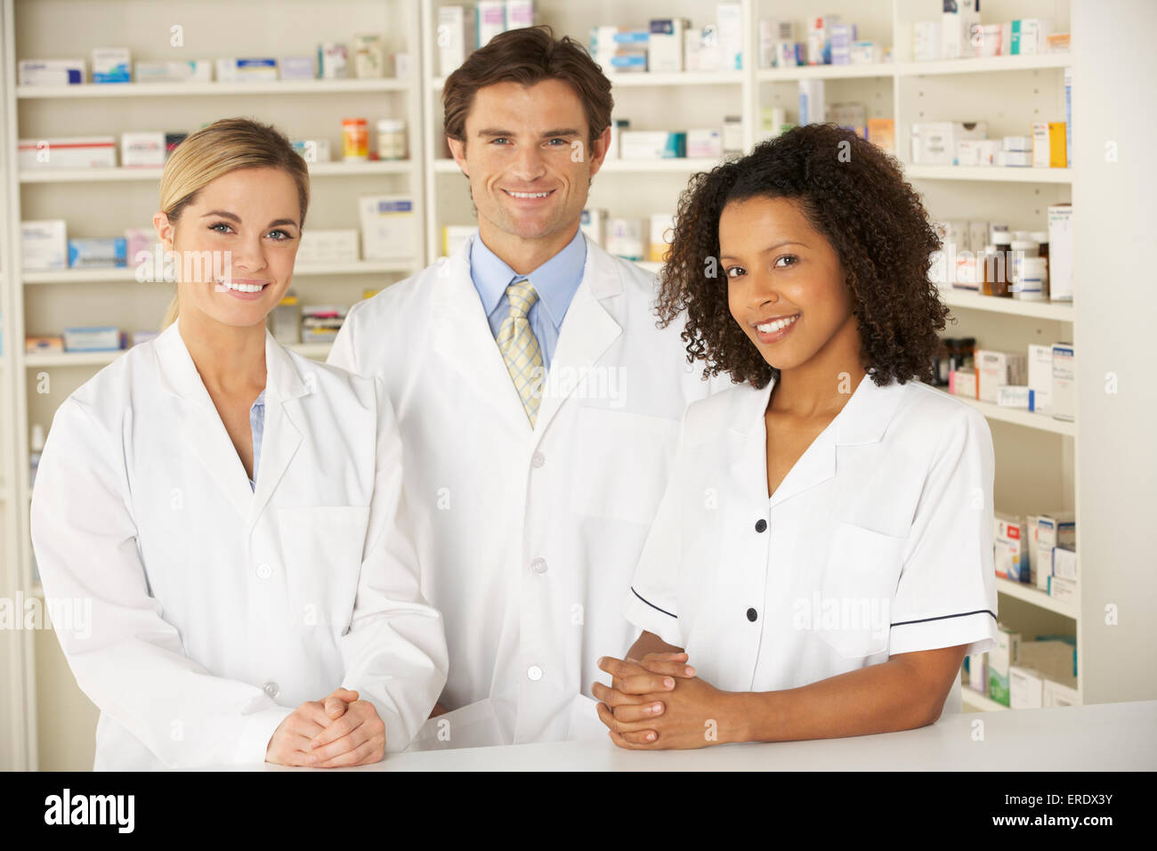 Nurse and pharmacists working in pharmacy Stock Photo - Alamy