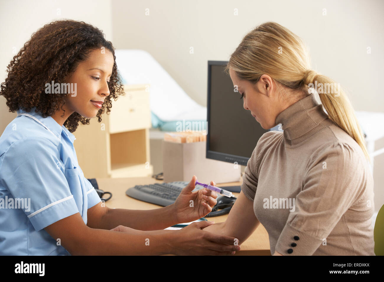 Woman injection arm hi-res stock photography and images - Alamy