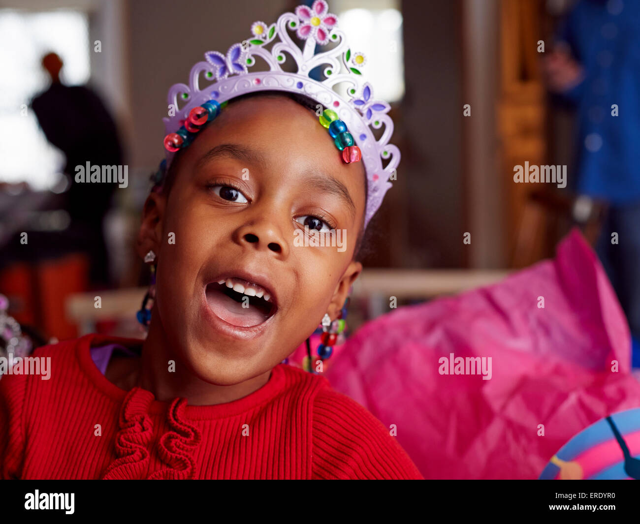 Black girl wearing tiara at party Stock Photo - Alamy