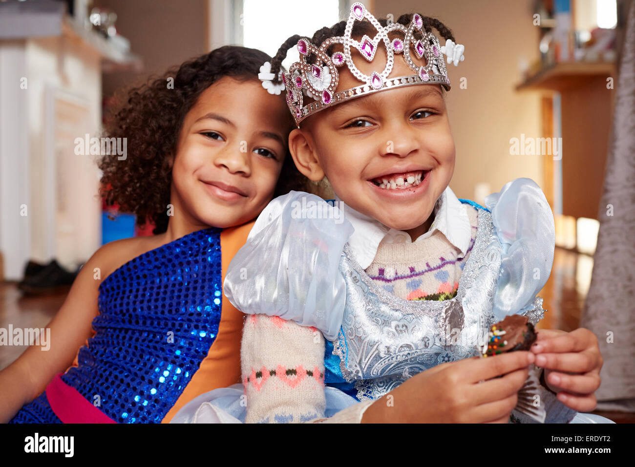 Smiling girls playing dress-up Stock Photo - Alamy