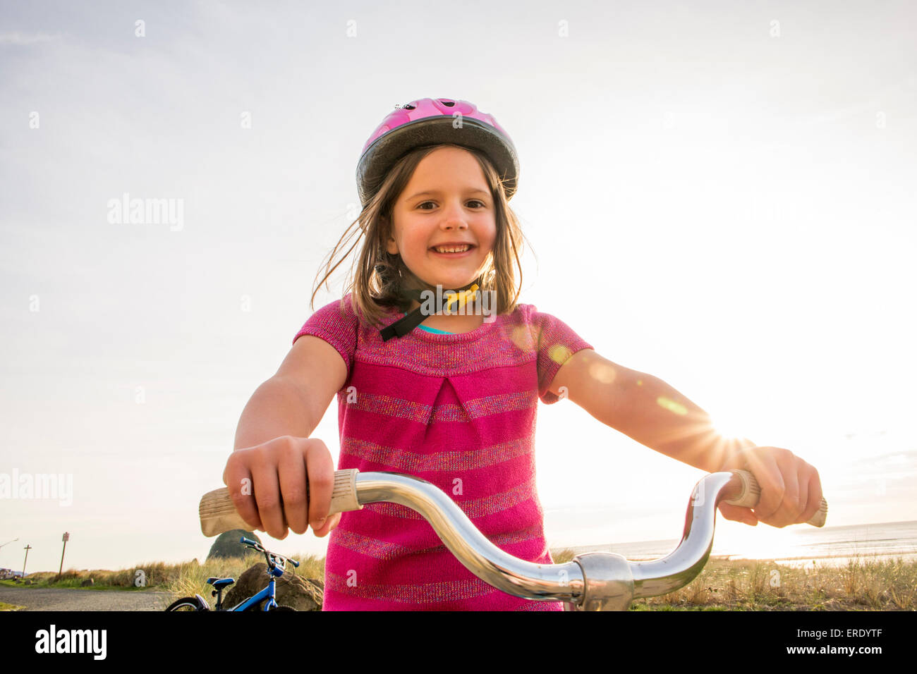 Girl riding on bicycle hi-res stock photography and images - Alamy