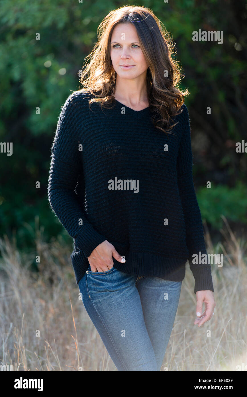 Tall woman standing hi-res stock photography and images - Alamy