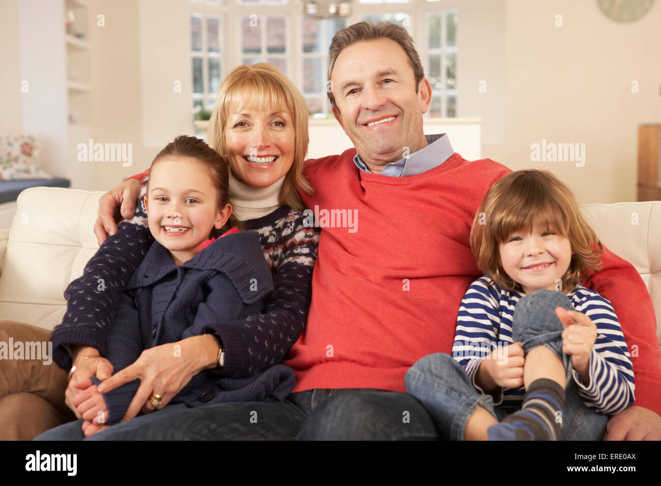 Portrait grandparents and grandchildren at home Stock Photo - Alamy