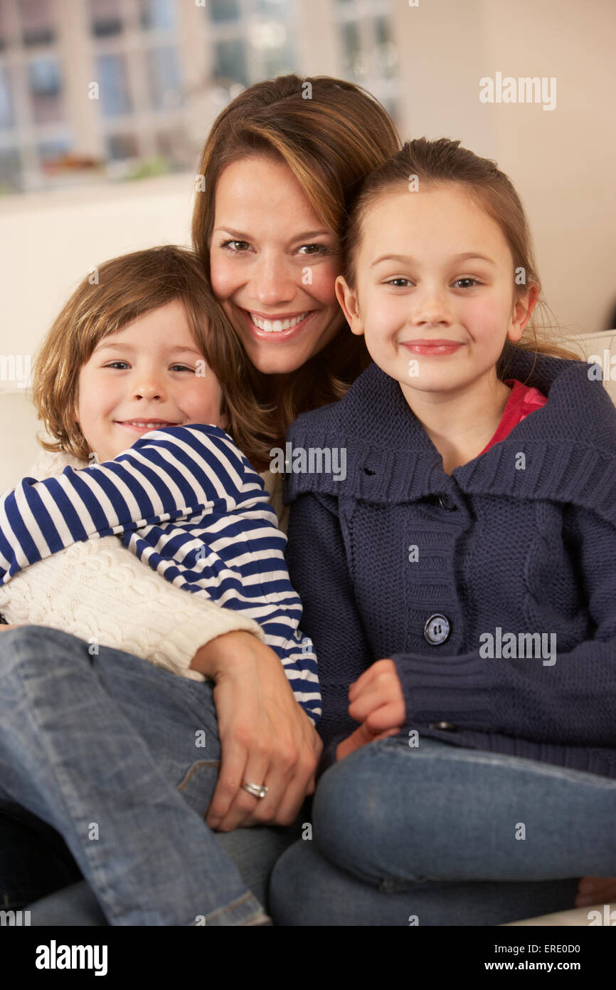 Portrait mother and children at home Stock Photo - Alamy