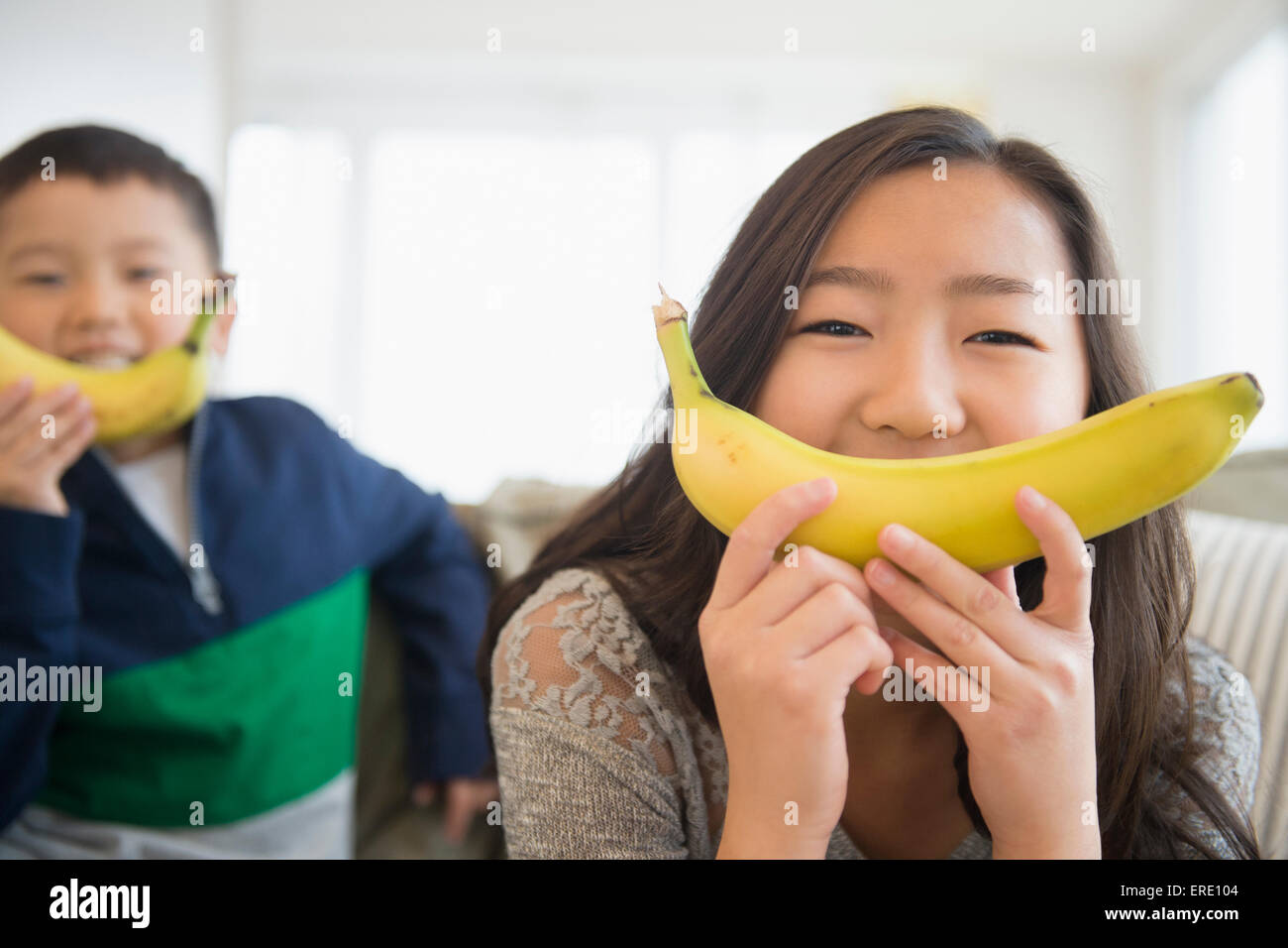 Child eating banana hi-res stock photography and images - Alamy