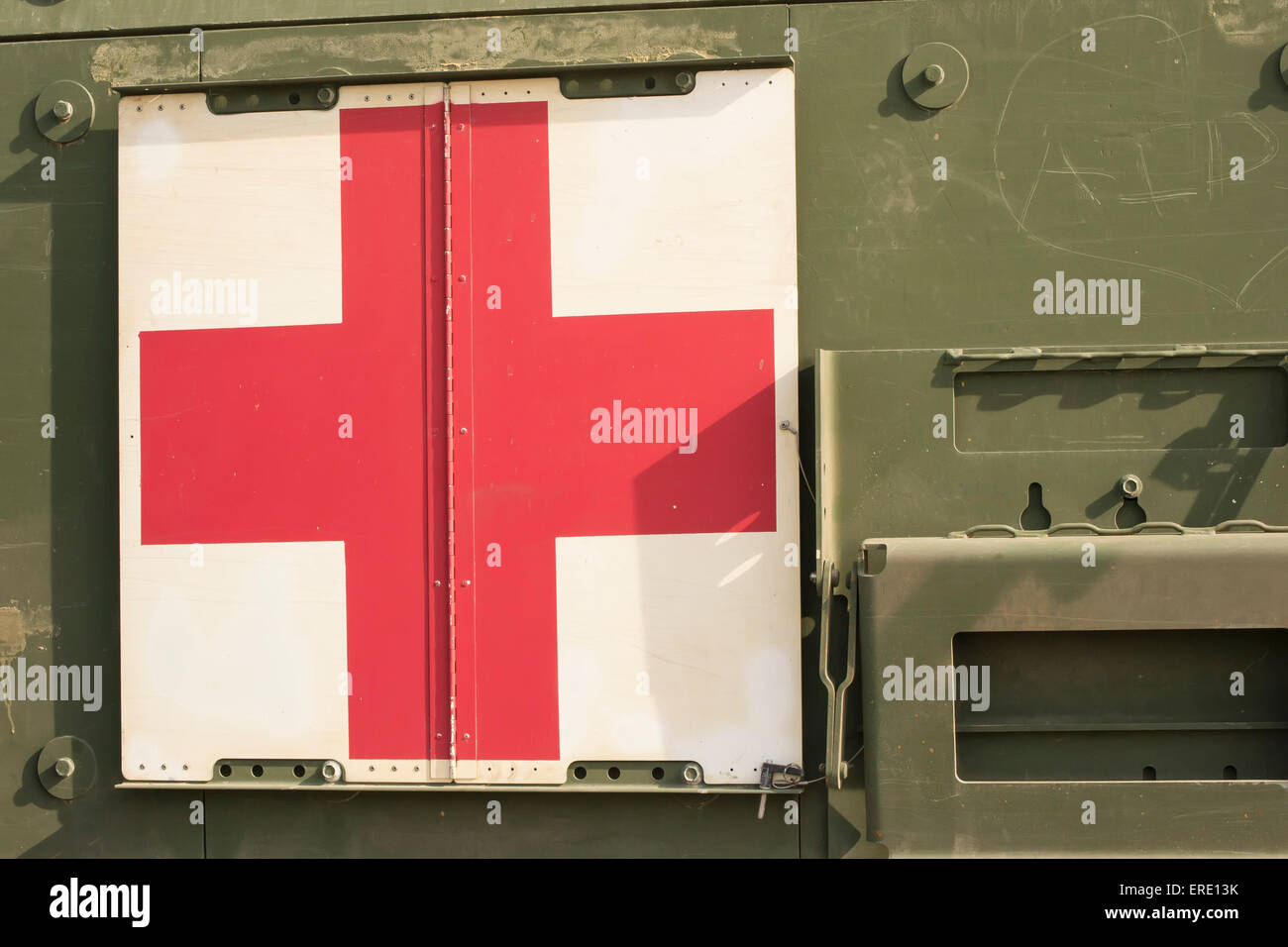 Military red cross symbol attached to an army vehicle serving as a ...