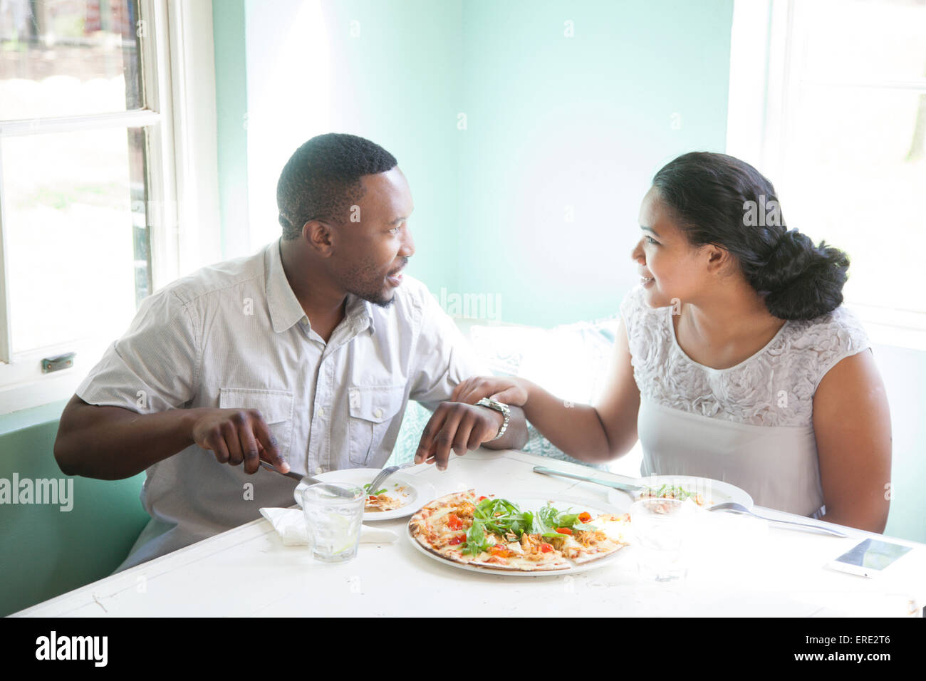 Couple eating together table hi-res stock photography and images - Alamy