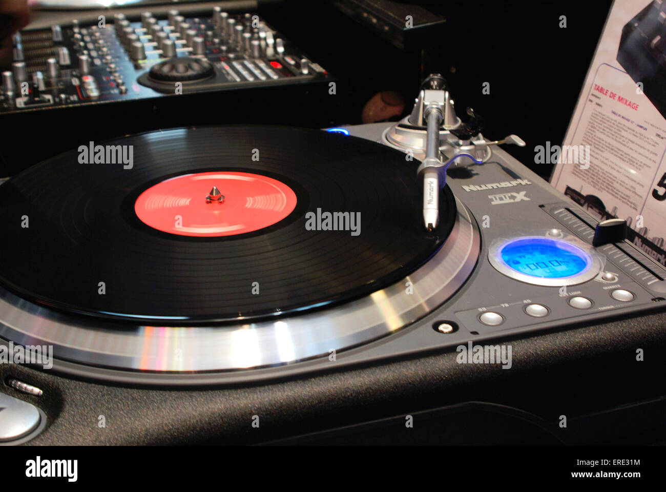 DJ - hands close-up. New equipment on show at professional audio trade ...