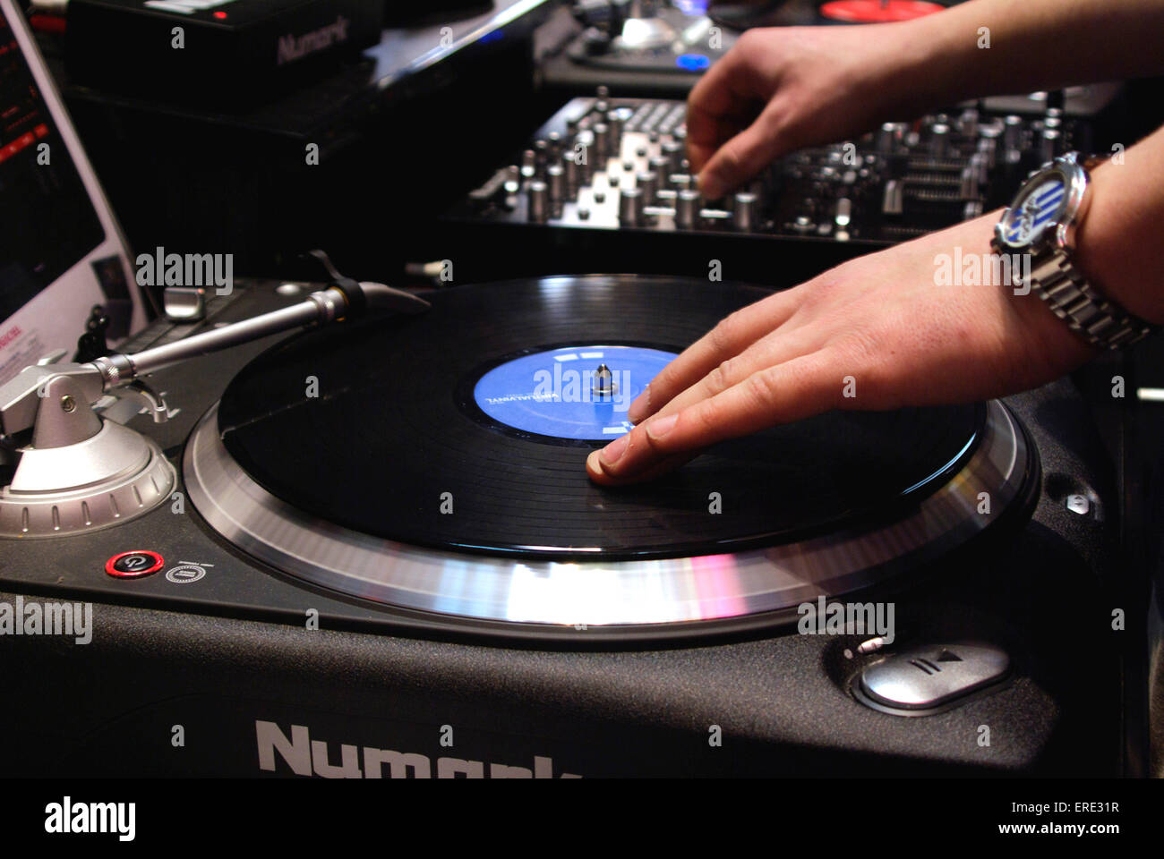 DJ - hands close-up. Close-up of record turntable and hands Stock Photo ...