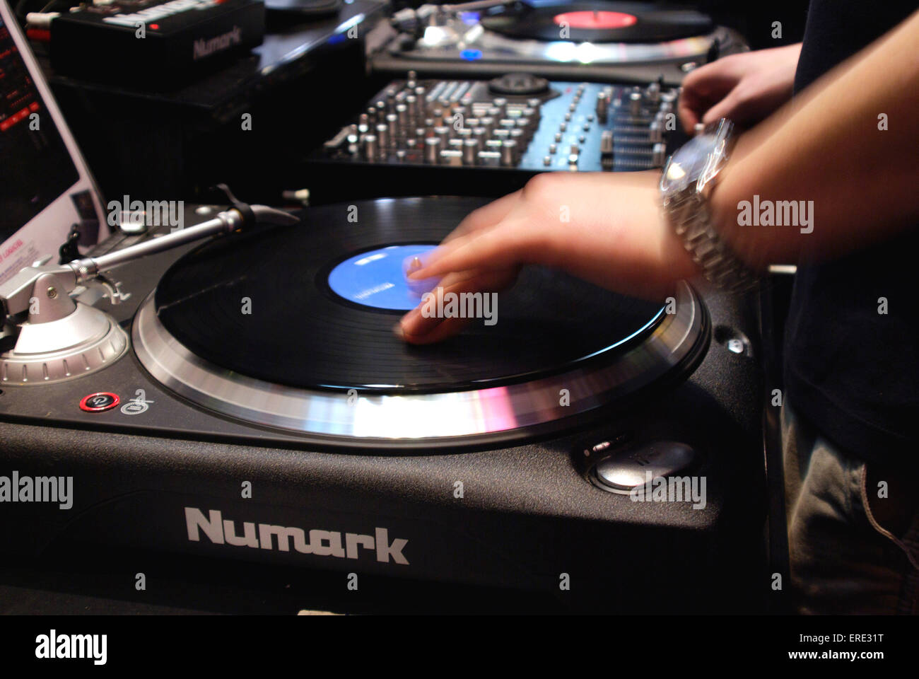 DJ - hands close-up. Close-up of record turntable and hands Stock Photo ...