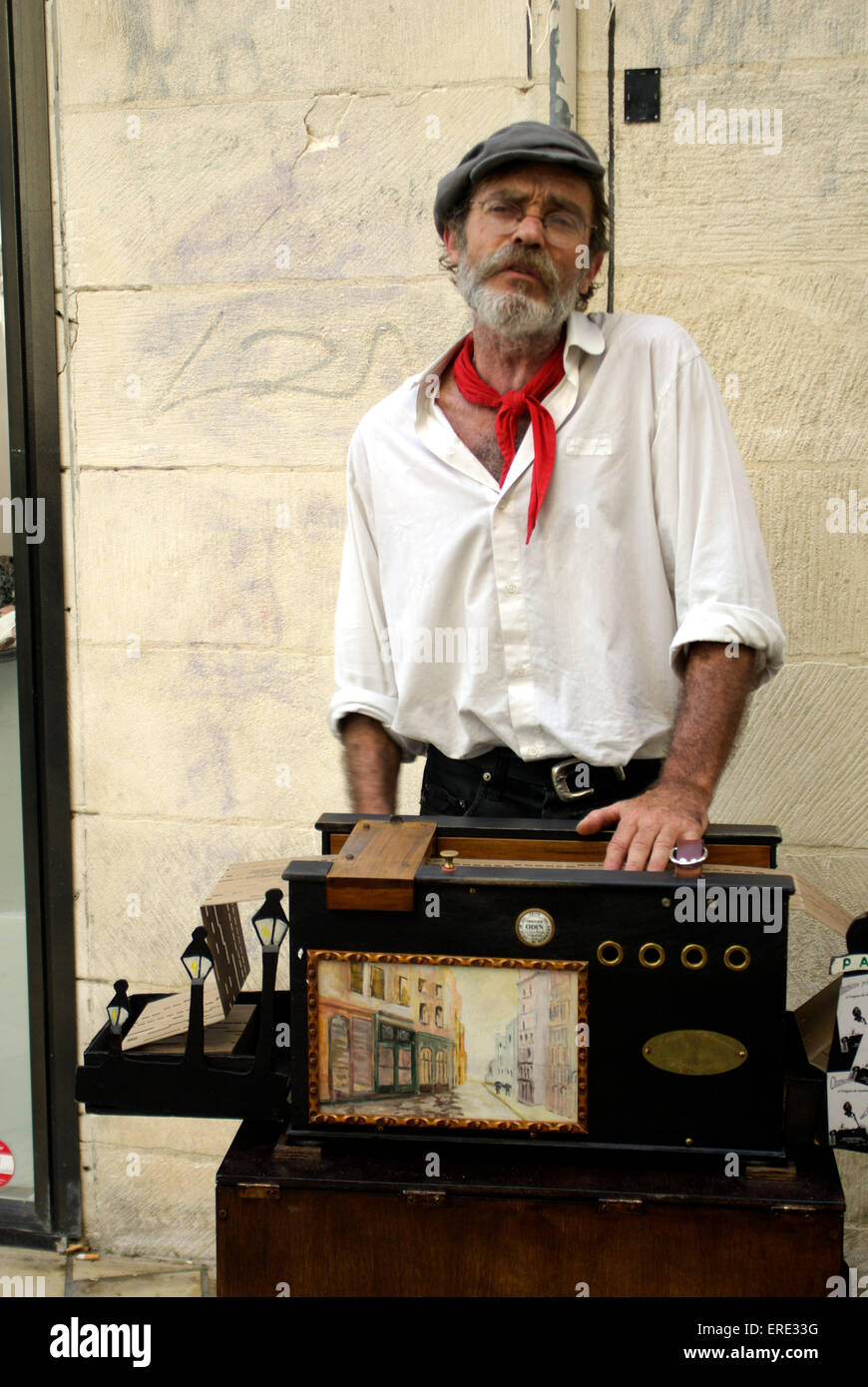 Busker playing a barrel organ in Avignon, in the South of France Stock ...