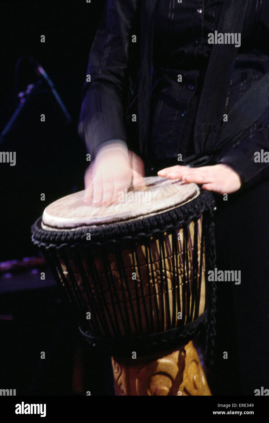 Close-up of percussionist's hands on an African drum showing hand ...
