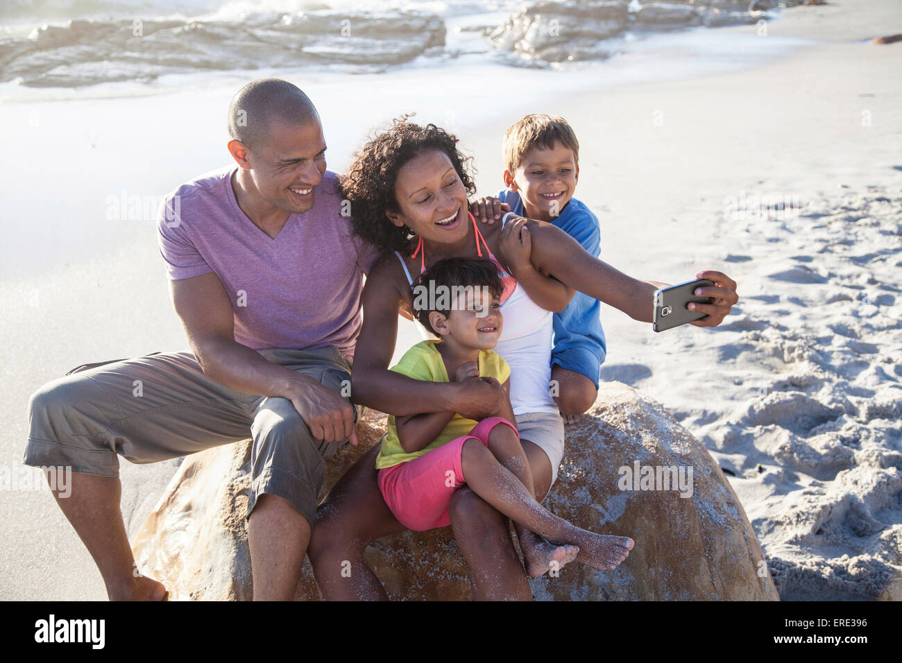 Happy family mixed race hi-res stock photography and images - Alamy