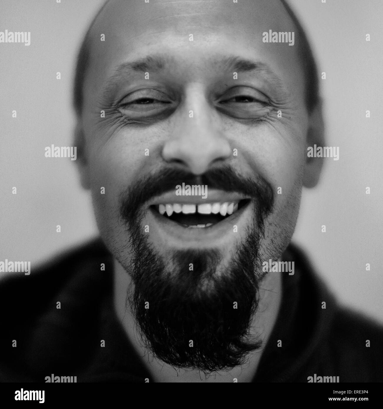 Close up smiling man looking Black and White Stock Photos & Images - Alamy