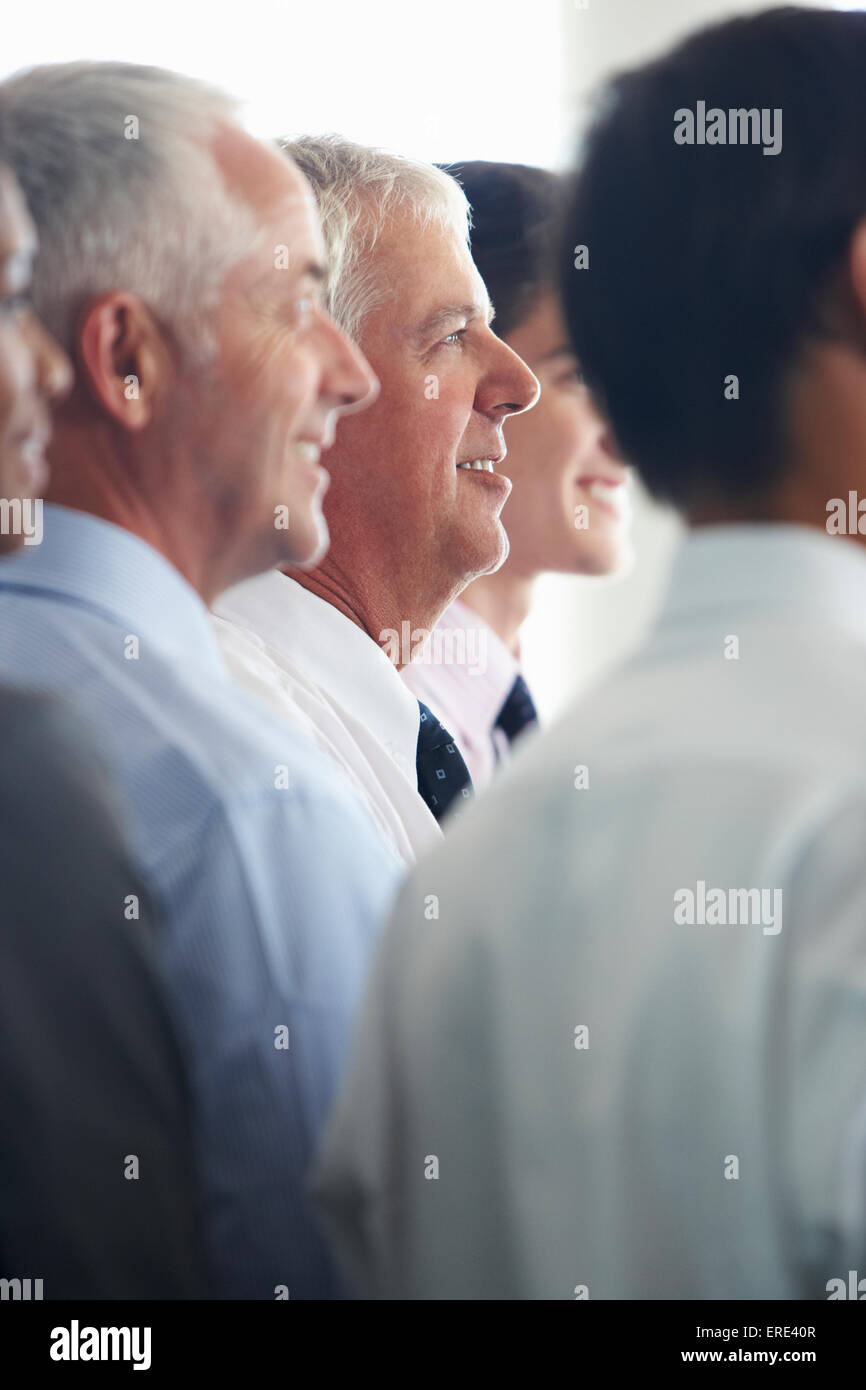Group Of Delegates Listening To Presentation At Conference Stock Photo ...