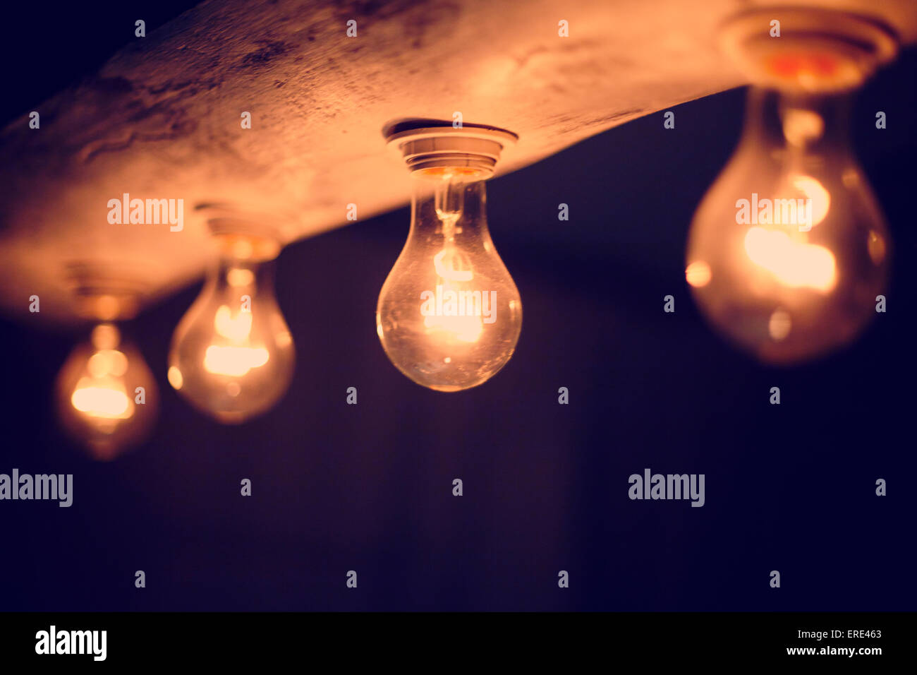 Close up of illuminated light bulbs at night Stock Photo - Alamy