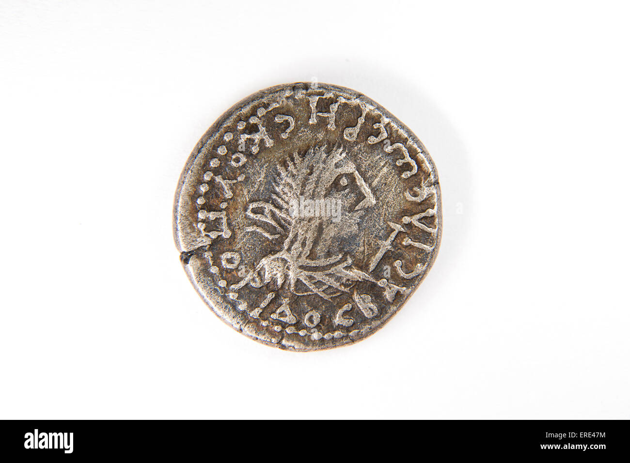 Old silver coin with portrait of king on a white background Stock Photo ...
