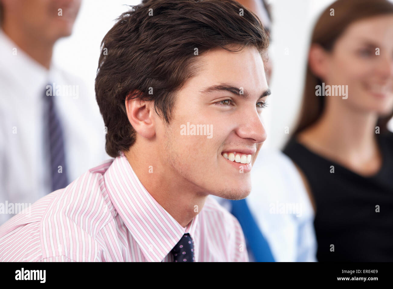 Group Of Delegates Listening To Presentation At Conference Stock Photo ...