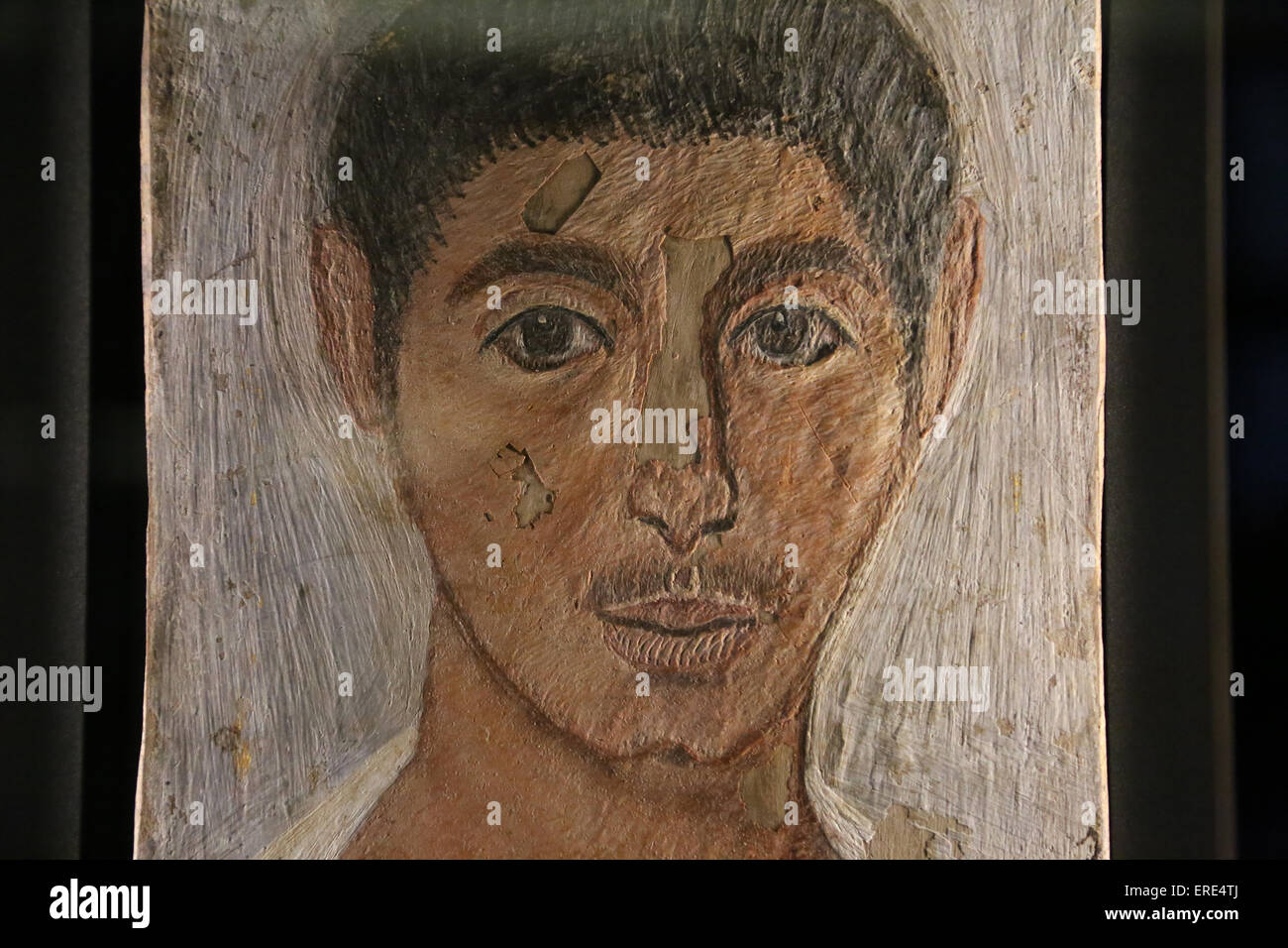Ancient Egypt. Portrait of a young man on tablet. From Fayum. Coptic ...