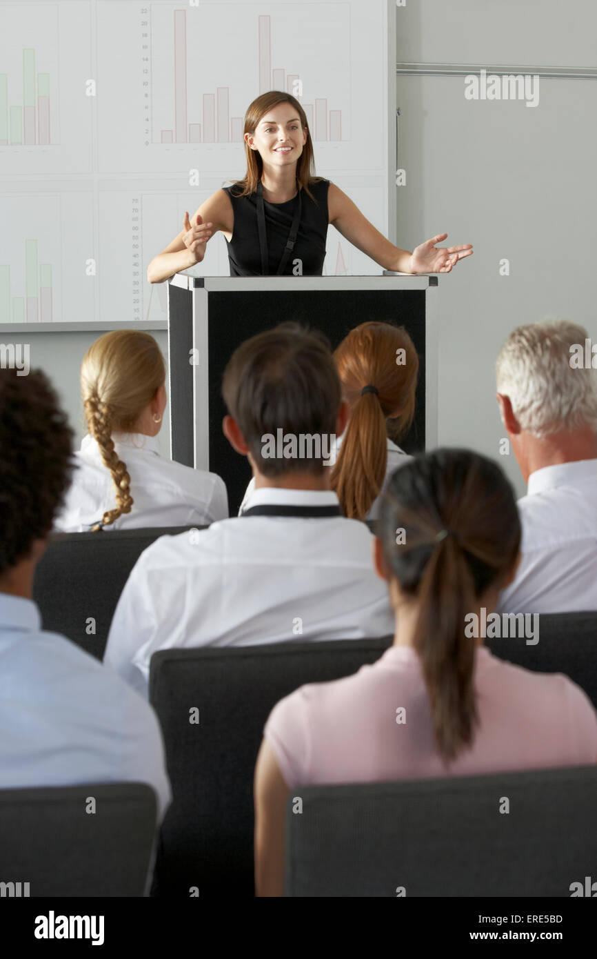 Businesswoman Delivering Presentation At Conference Stock Photo - Alamy