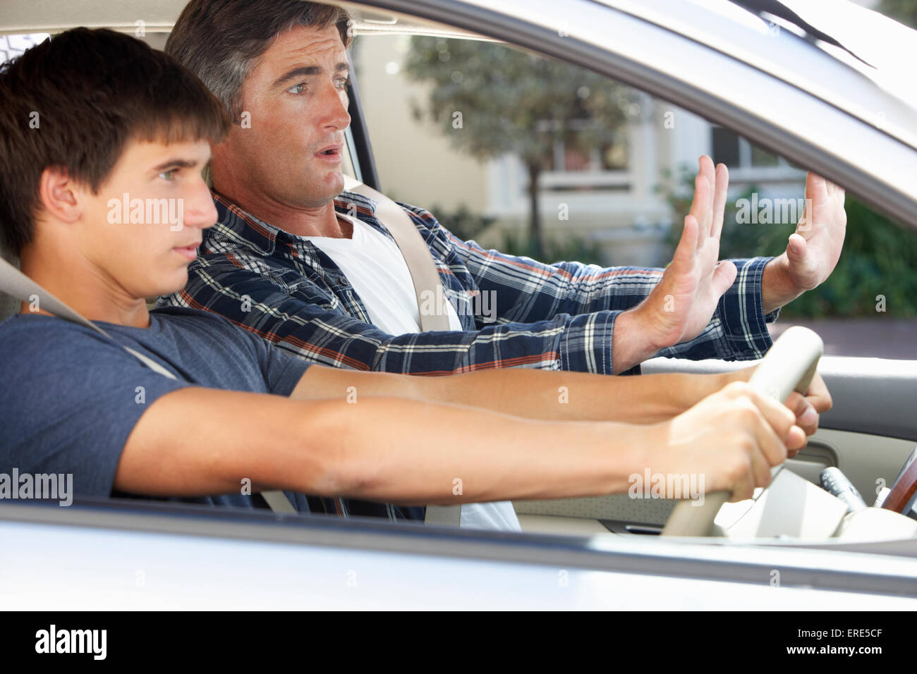 Father teaching son drive car hi-res stock photography and images - Alamy