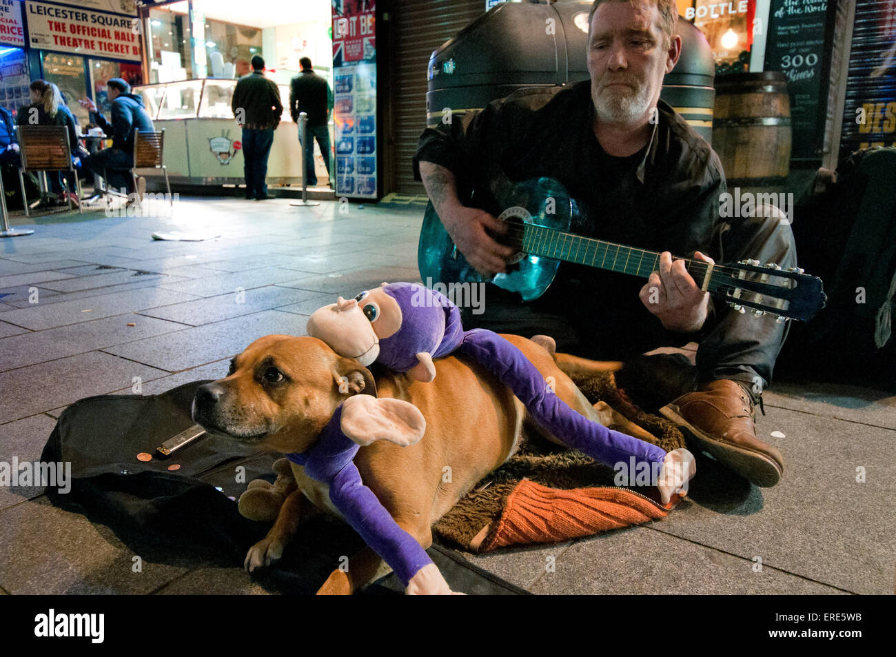 Homeless man with dog hi-res stock photography and images - Alamy