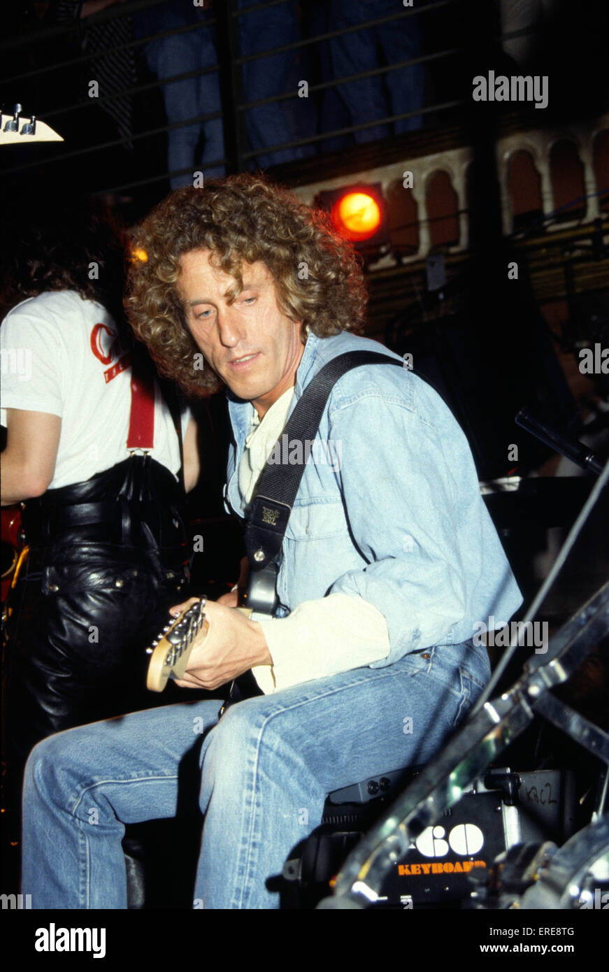 Roger Daltrey (b. 1944), lead singer with English band The Who, playing ...