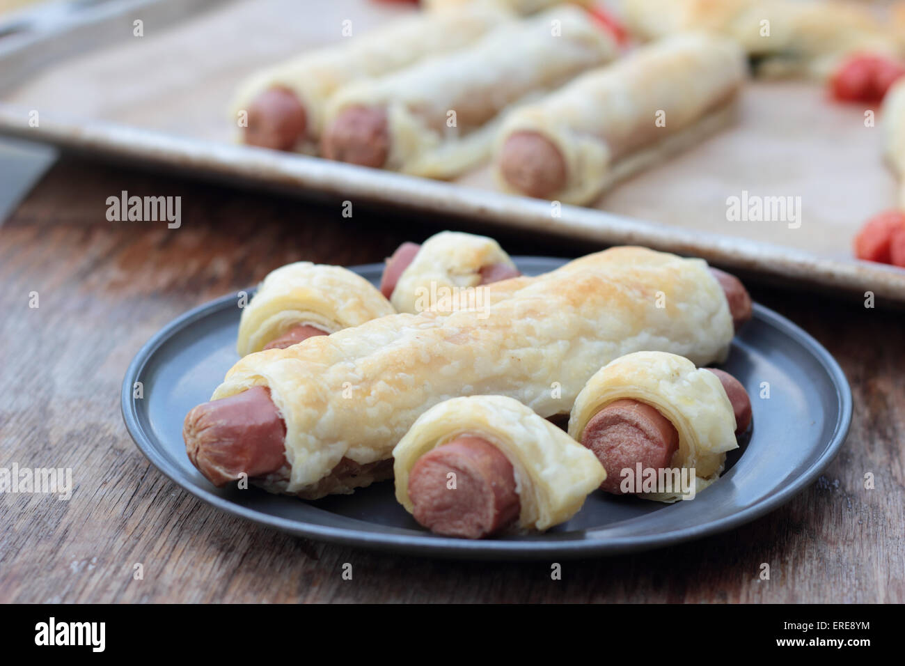 Wiener sausage in French pastry on a tin plate Stock Photo - Alamy