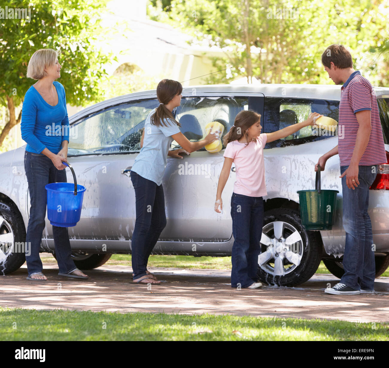 Family Washing Car Together Stock Photo - Alamy